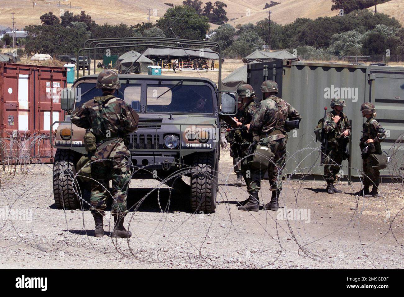 Multi-unit participants of GOLDEN MEDIC 2001, man an entry control ...