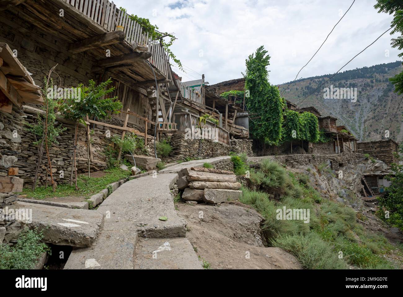 Traditional masonry and wood beams architecture of a Kalash village ...