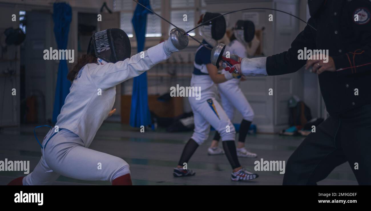 The female contestants practicing forf the International fencing cup in ...