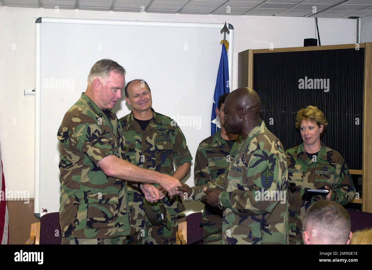 General Michael E. Ryan, Air Force CHIEF of STAFF, is presented a coin ...