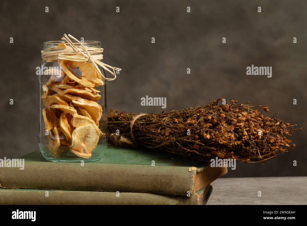 Dried apples chips in jar Stock Photo - Alamy