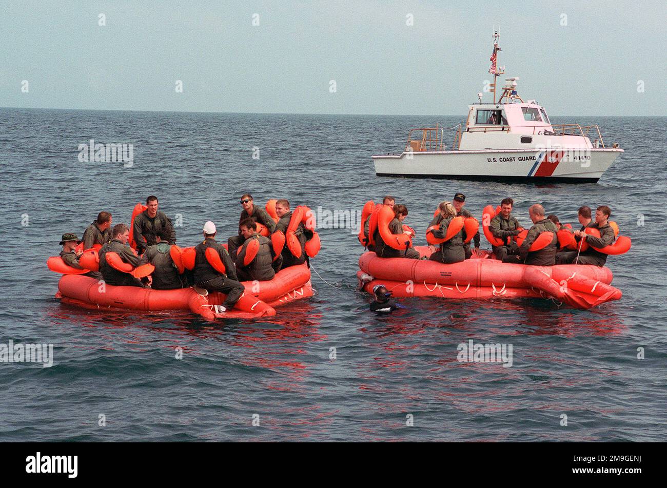 A US Coast Guard cutter from Milwaukee, Wisconsin stands by as aircrews ...