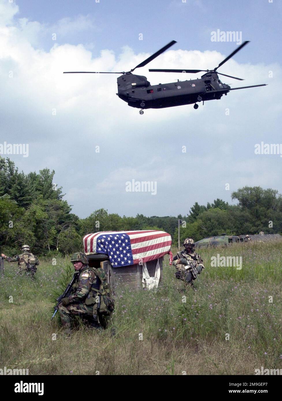 An MH-47E Chinook, carrying "rescued" 128th Air Refueling Wing, General ...