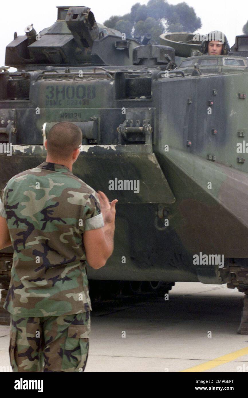 010804-F-9631D-008. [Complete] Scene Caption: Lance Corporal Chris ...