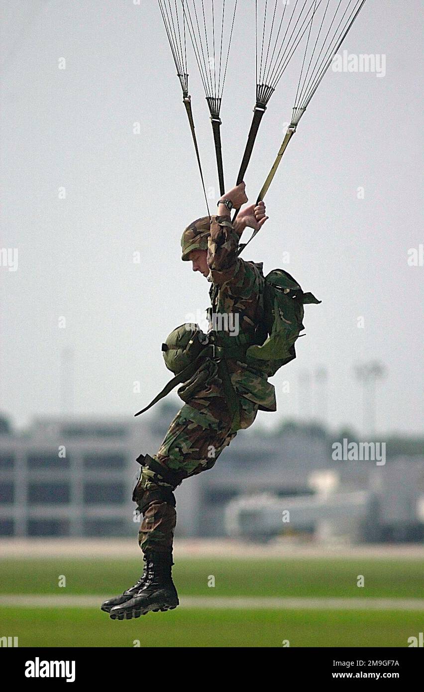 010809-F-1644L-001. [Complete] Scene Caption: A member of the Army's ...