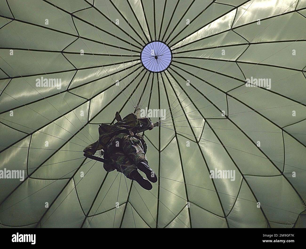 010809-F-1644L-009. [Complete] Scene Caption: A member of the Army's ...