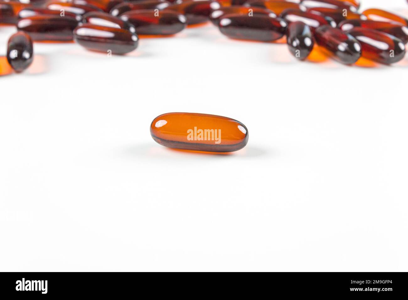 Leptin capsules on white background. Leptin is an appetite reducing ...