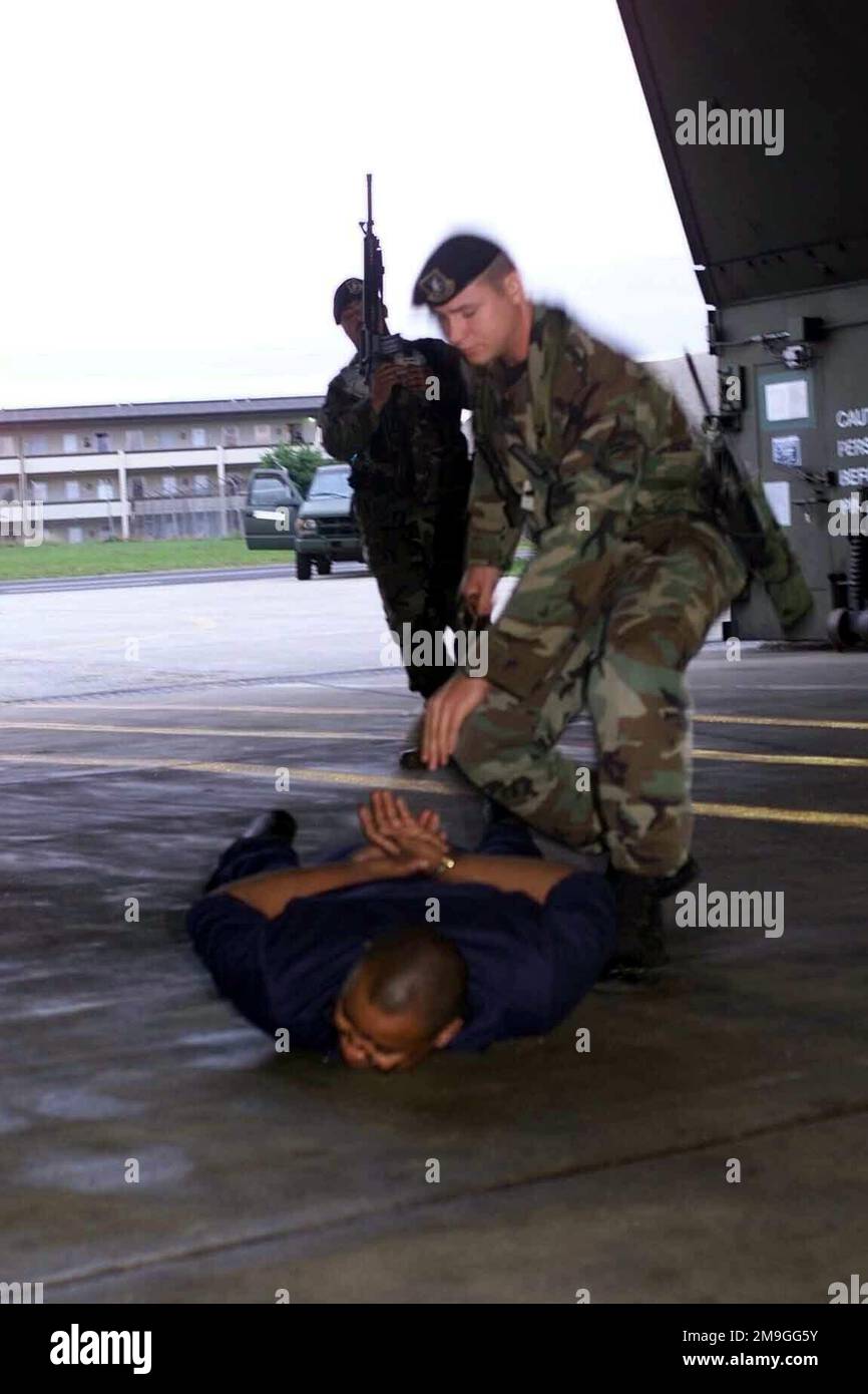 52d Security Forces Squadron member AIRMAN First Class Jason Jacobs ...