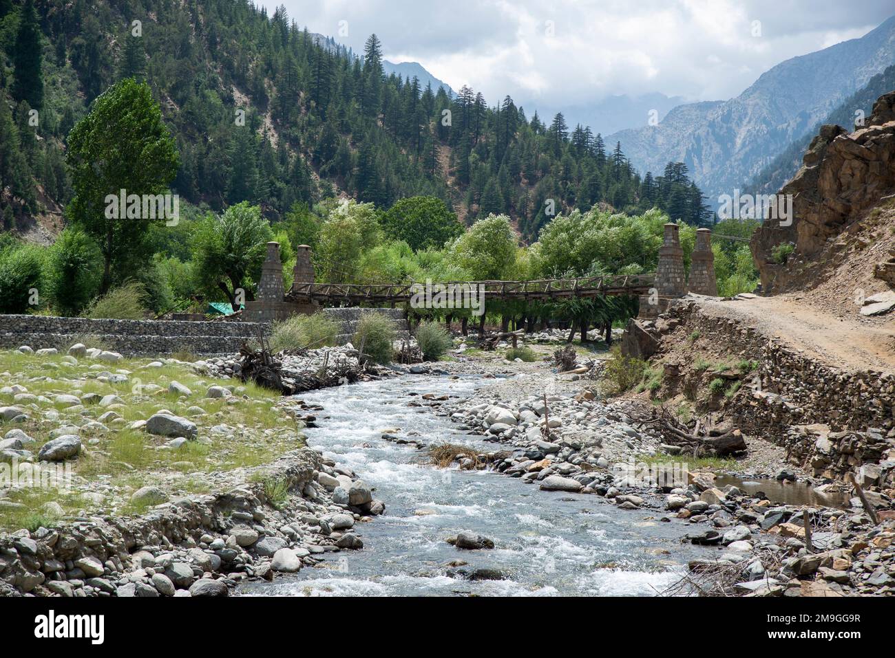 Suspension bridge in Shaikhanandah village, Bumburet Valley, Pakistan ...