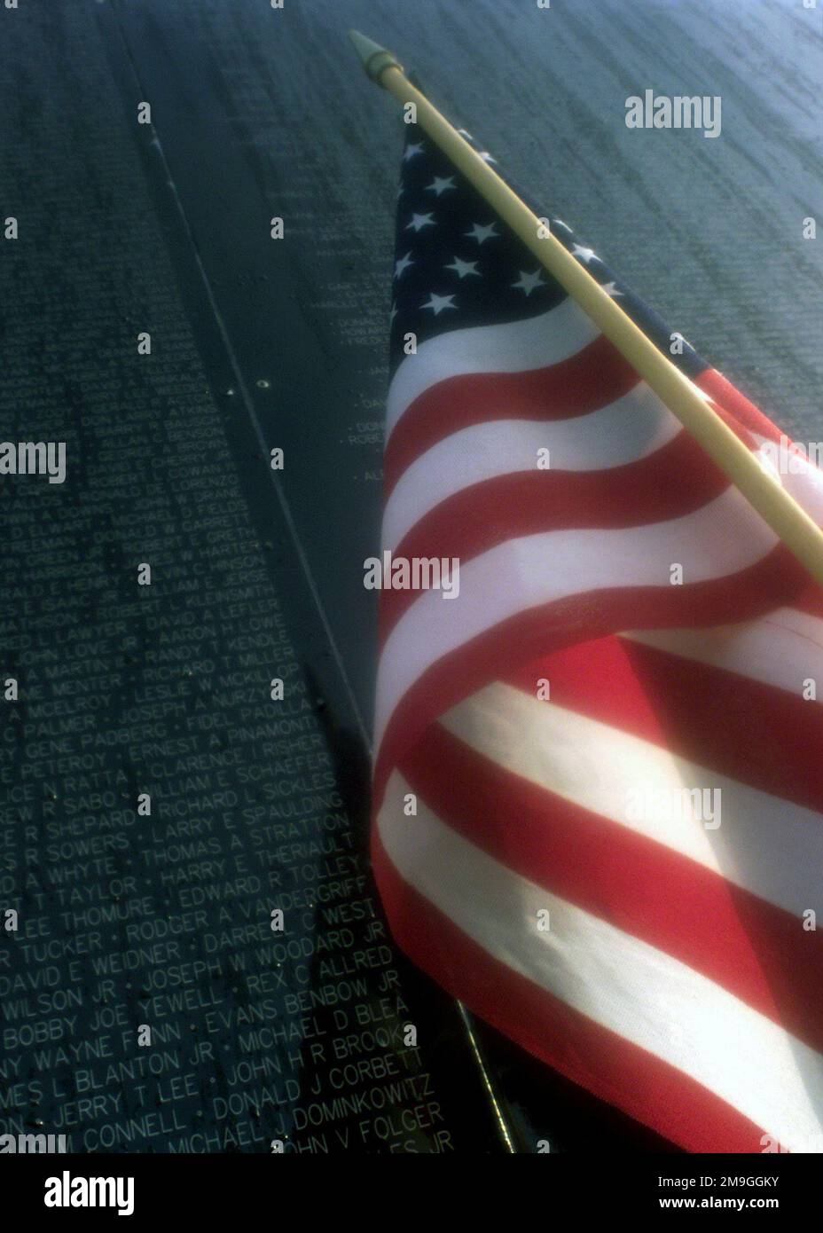 The sun rises on names engraved on the replica of the original Vietnam ...