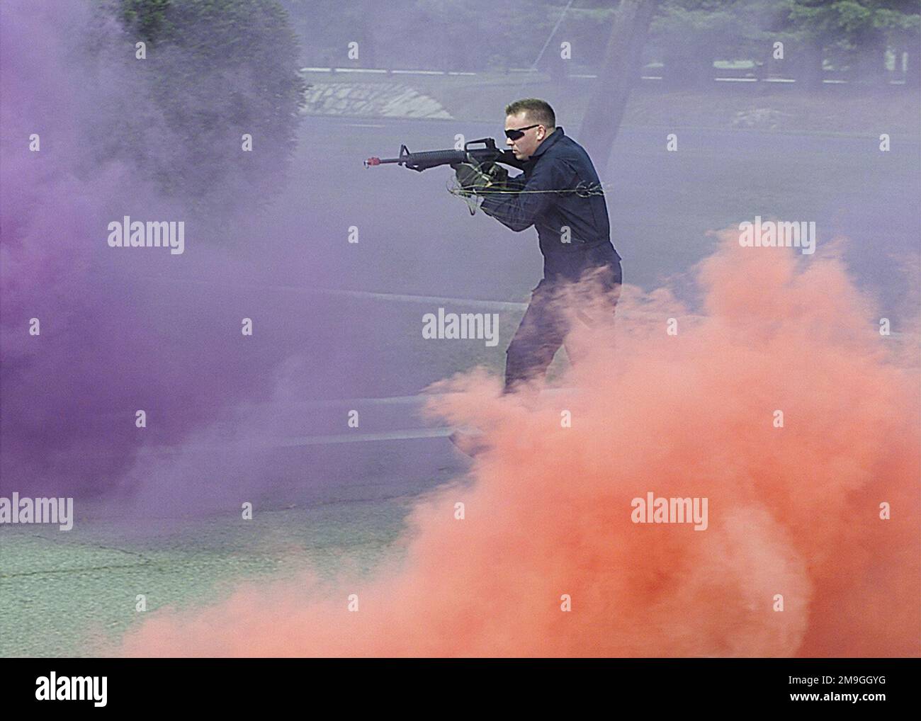 Using the cover of smoke grenades, STAFF Sergeant (SSGT) Aaron Lewis ...