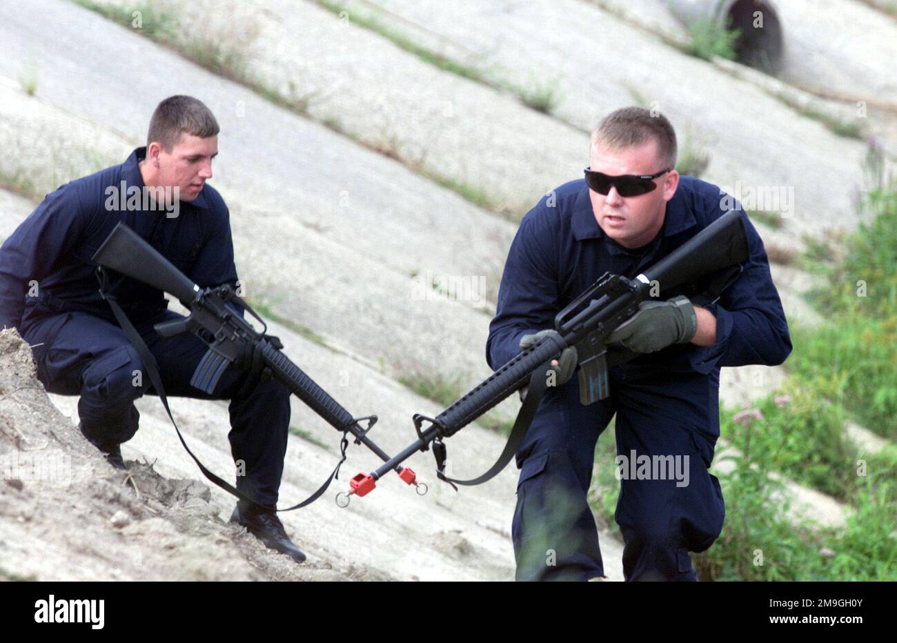 With their Colt M16A2 5.56mm Assault Rifles, with blank adapters, STAFF ...