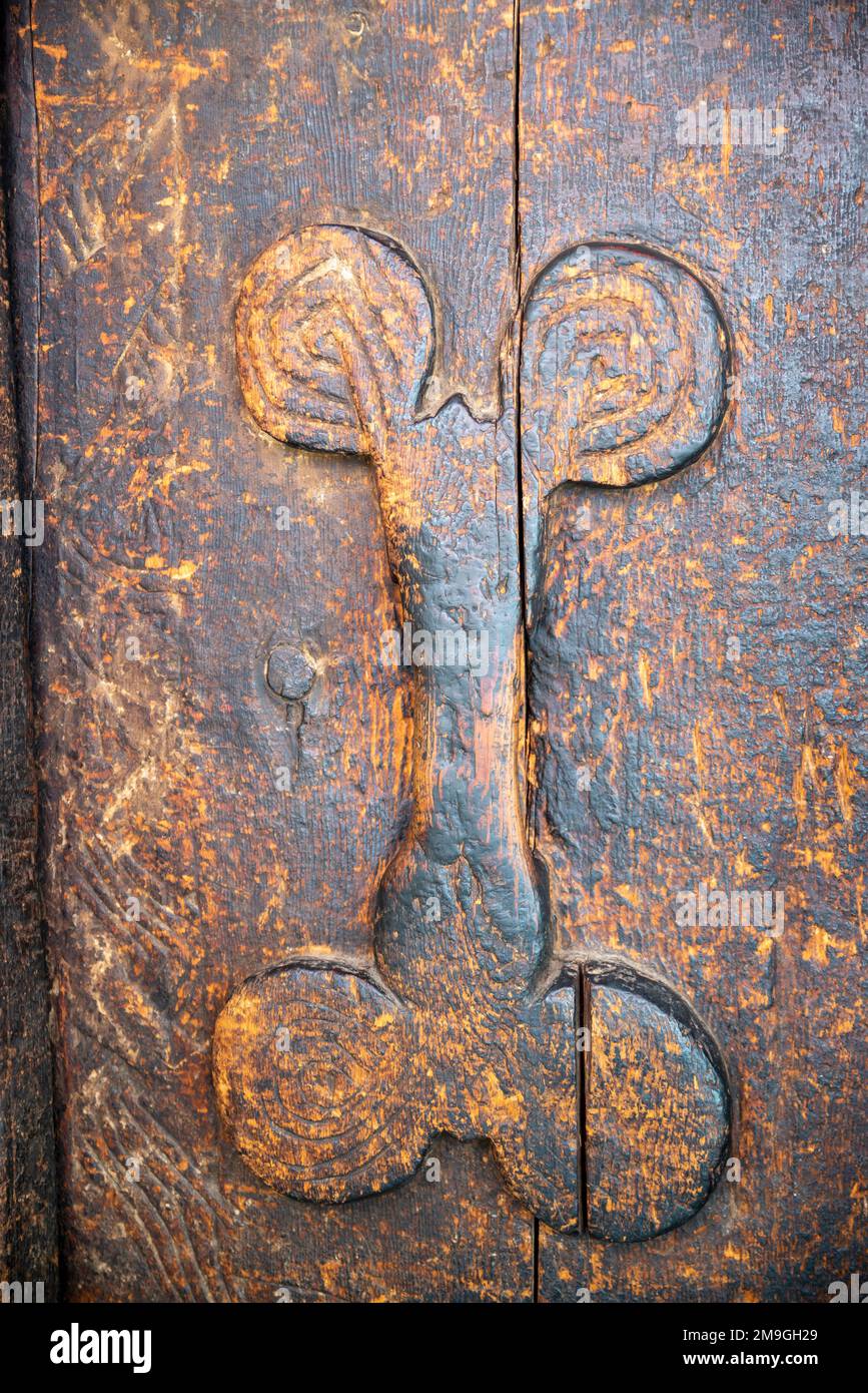 Ancient door of a Kalash house with traditional motif, Bumburet Valley ...