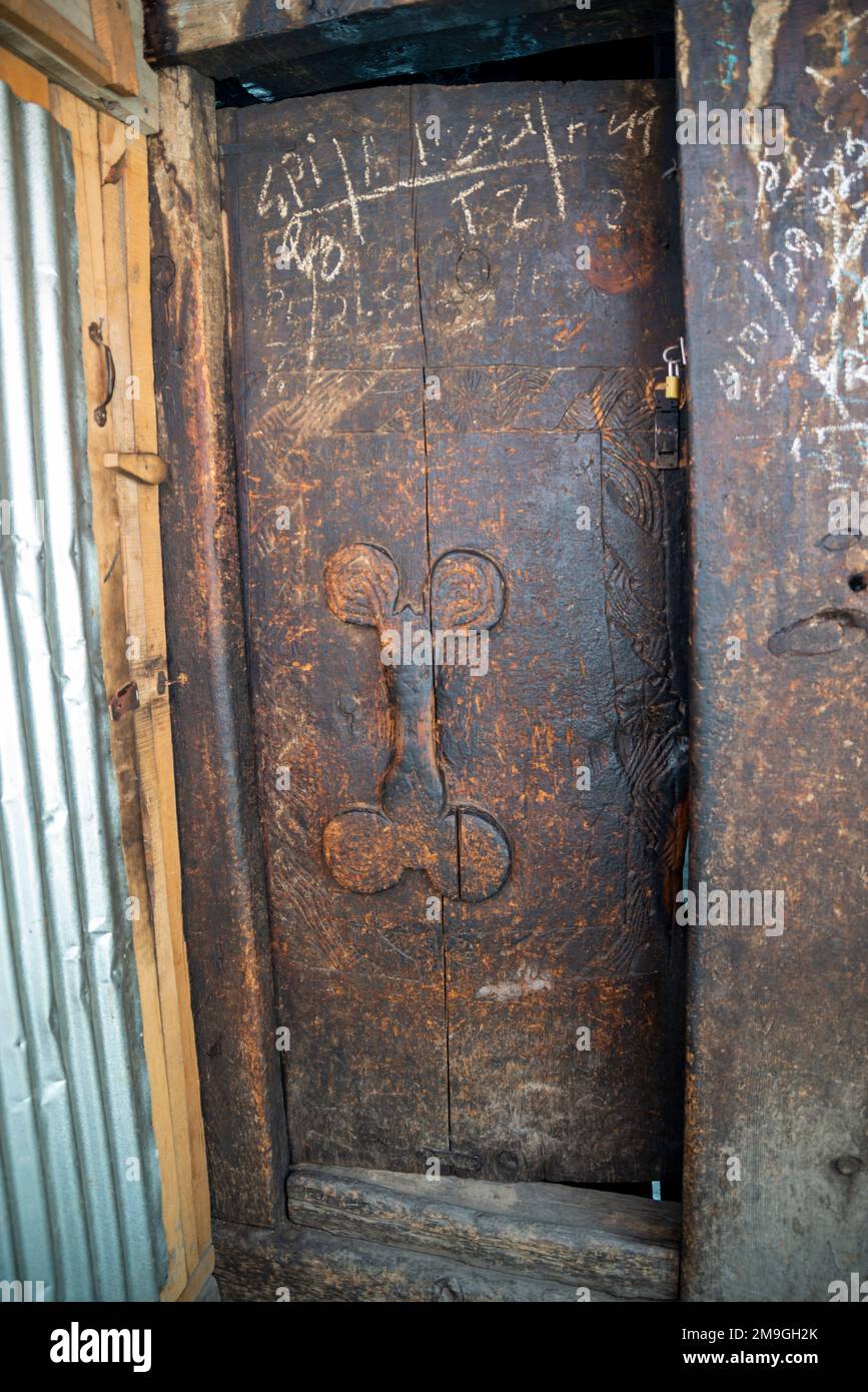 Ancient door of a Kalash house with traditional motif, Bumburet Valley ...