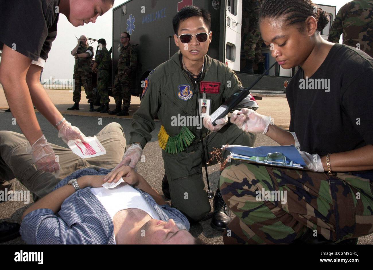 As SENIOR AIRMAN Prane Stevens, USAF, (right), an medical ...