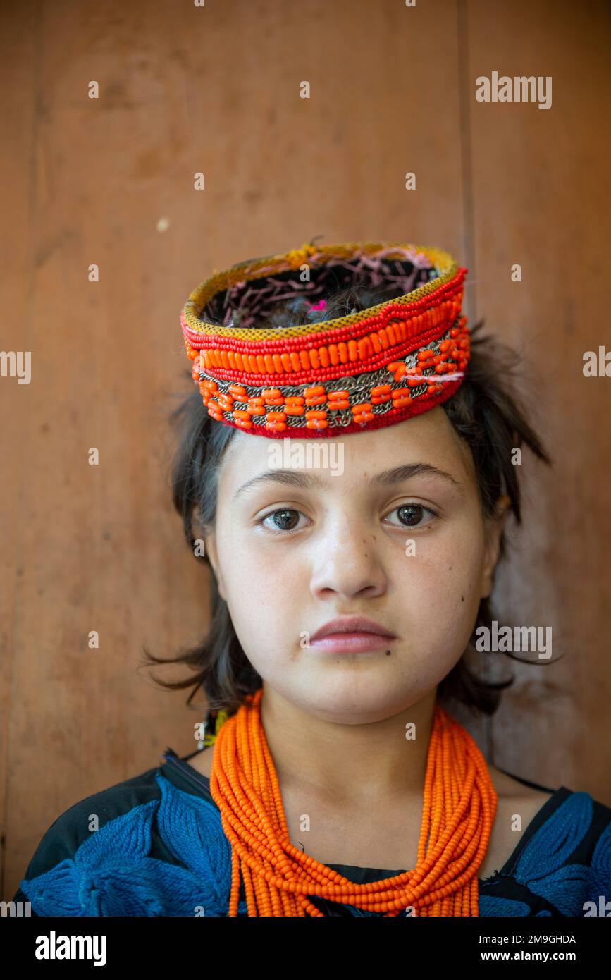 Portrait of a Kalash girl with colorful traditional headdress, Bumburet ...