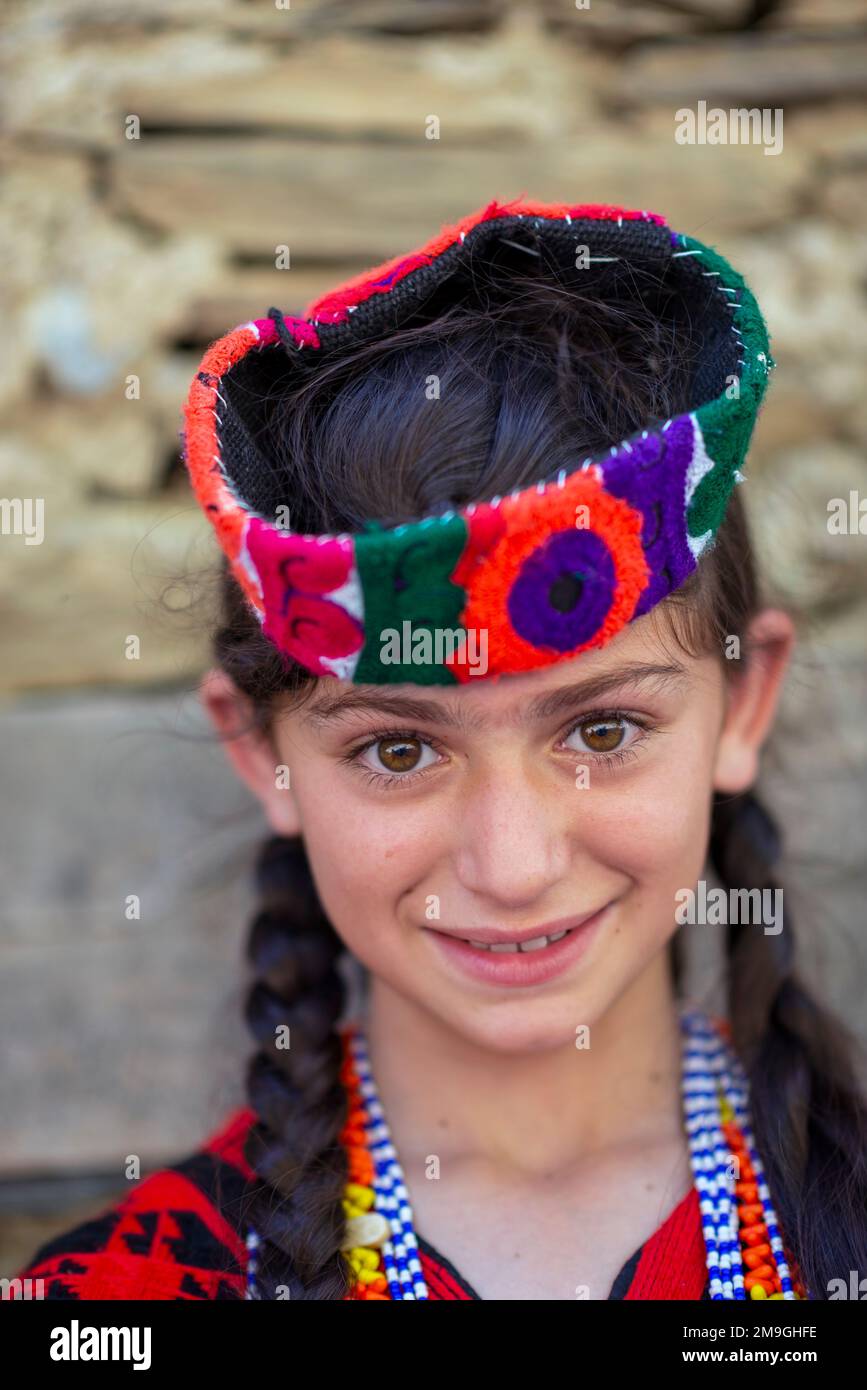 Portrait of a Kalash girl with colorful traditional headdress, Bumburet ...