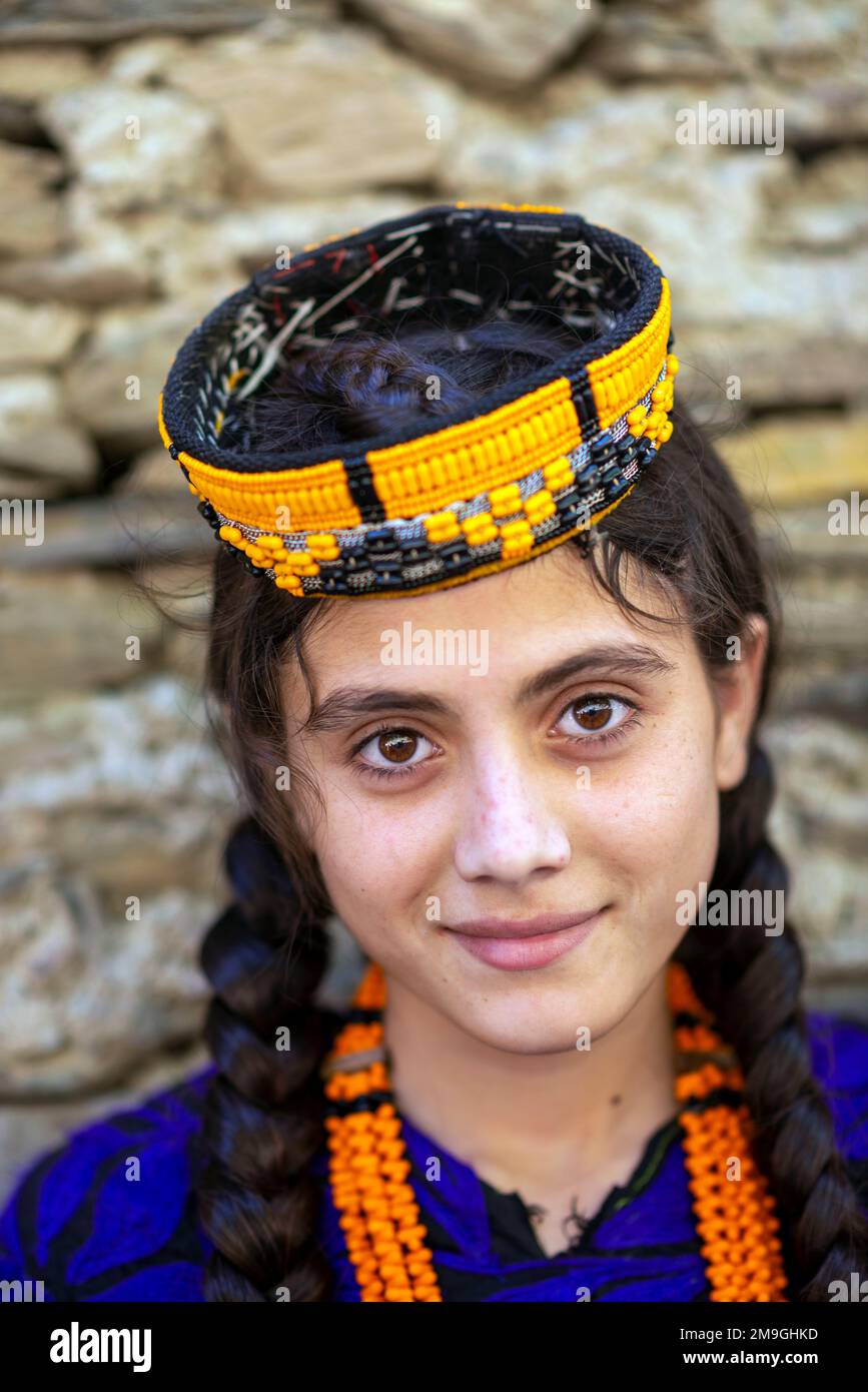 Portrait of a Kalash girl with colorful traditional headdress, Bumburet ...