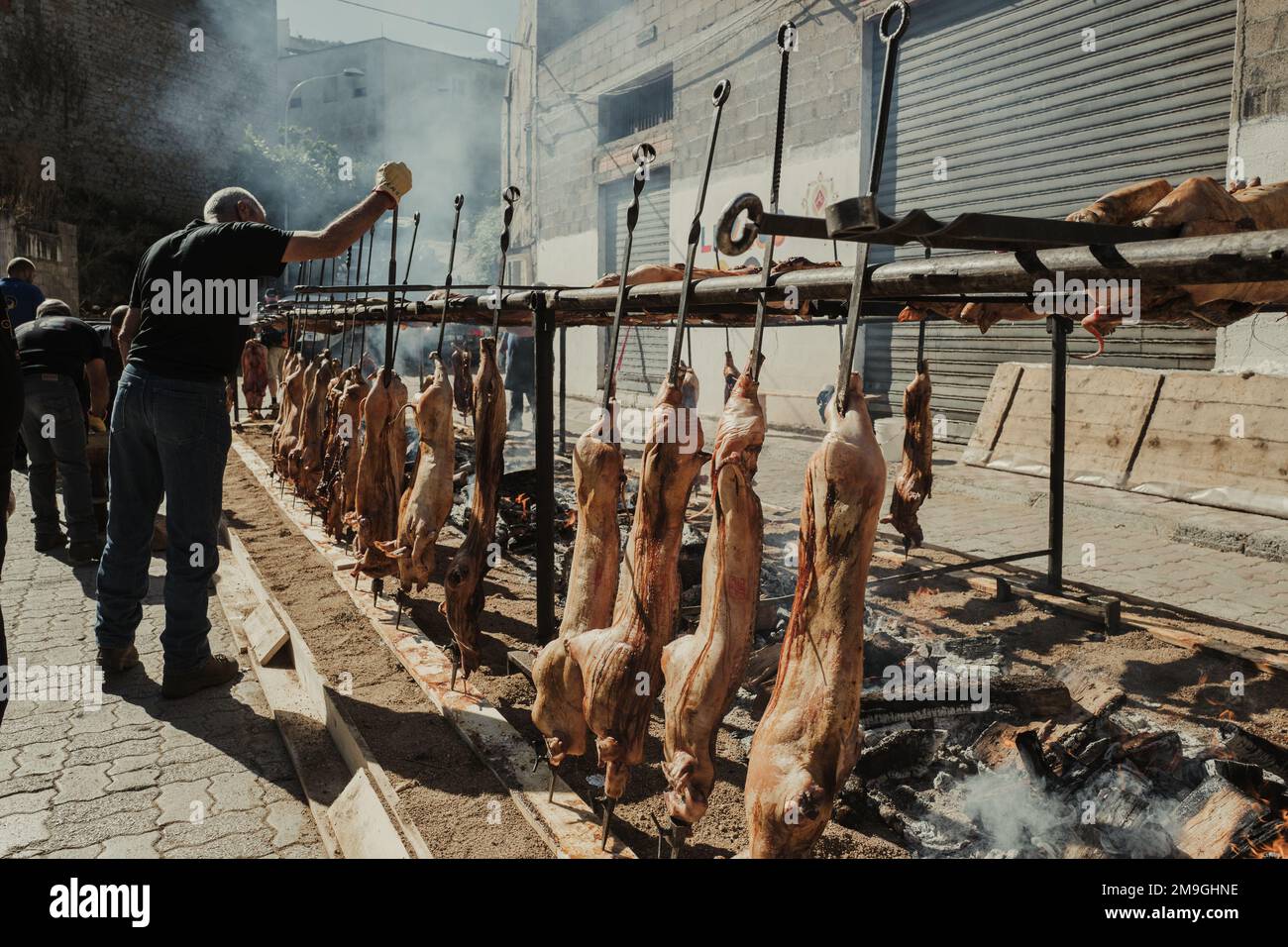 ORGOSOLO, SARDINIA /OCTOBER 2019: The old tradition of cooking the ...