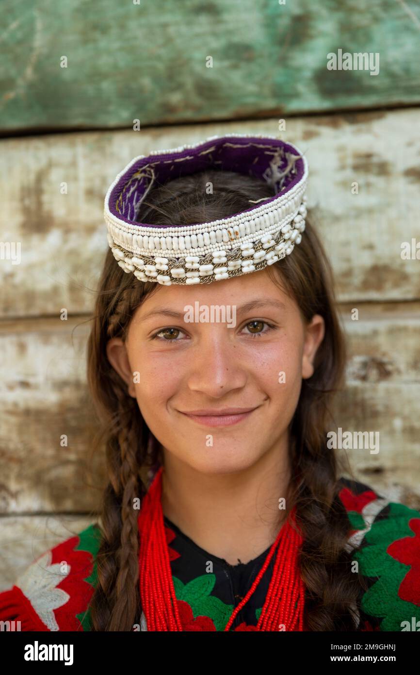 Portrait of a Kalash girl with colorful traditional headdress, Bumburet ...