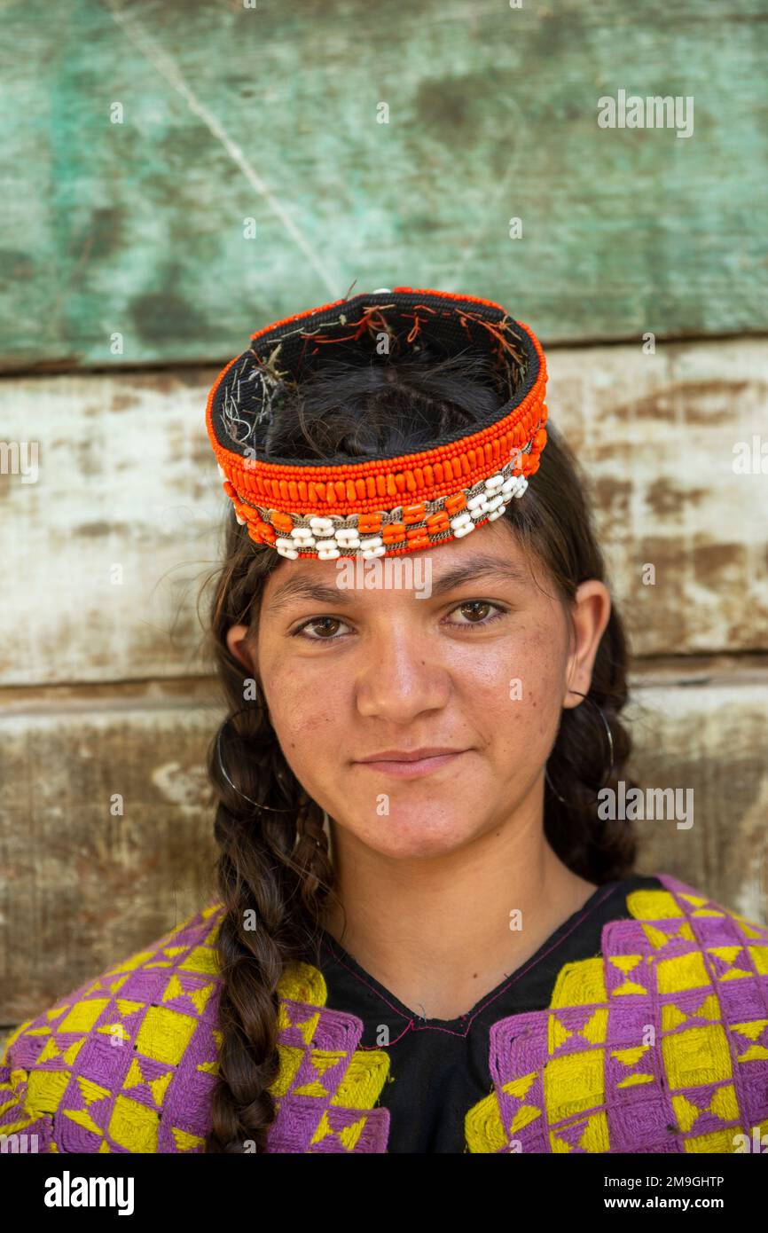 Portrait of a Kalash girl with colorful traditional headdress, Bumburet ...