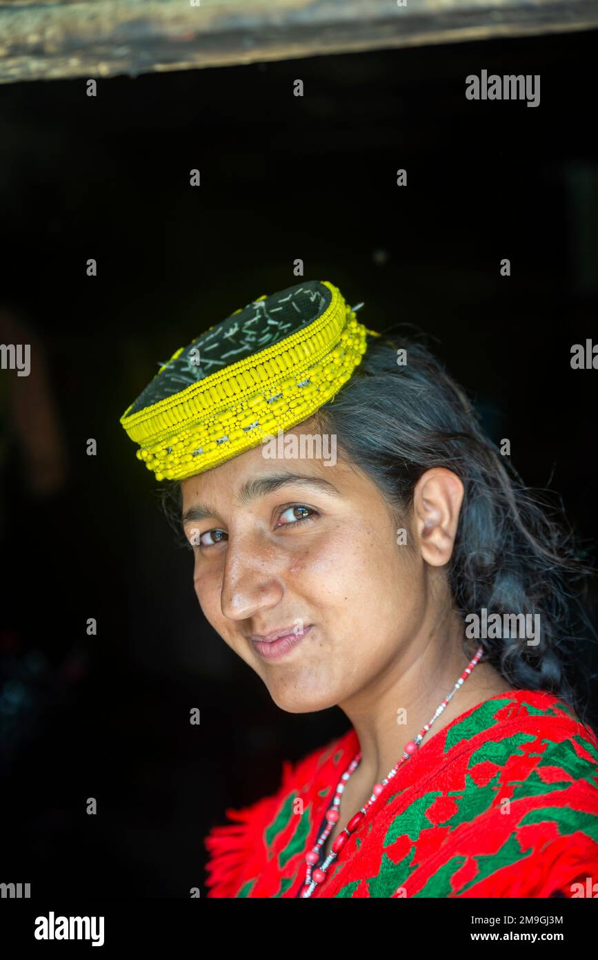 Portrait of a Kalash girl with colorful traditional headdress, Bumburet ...