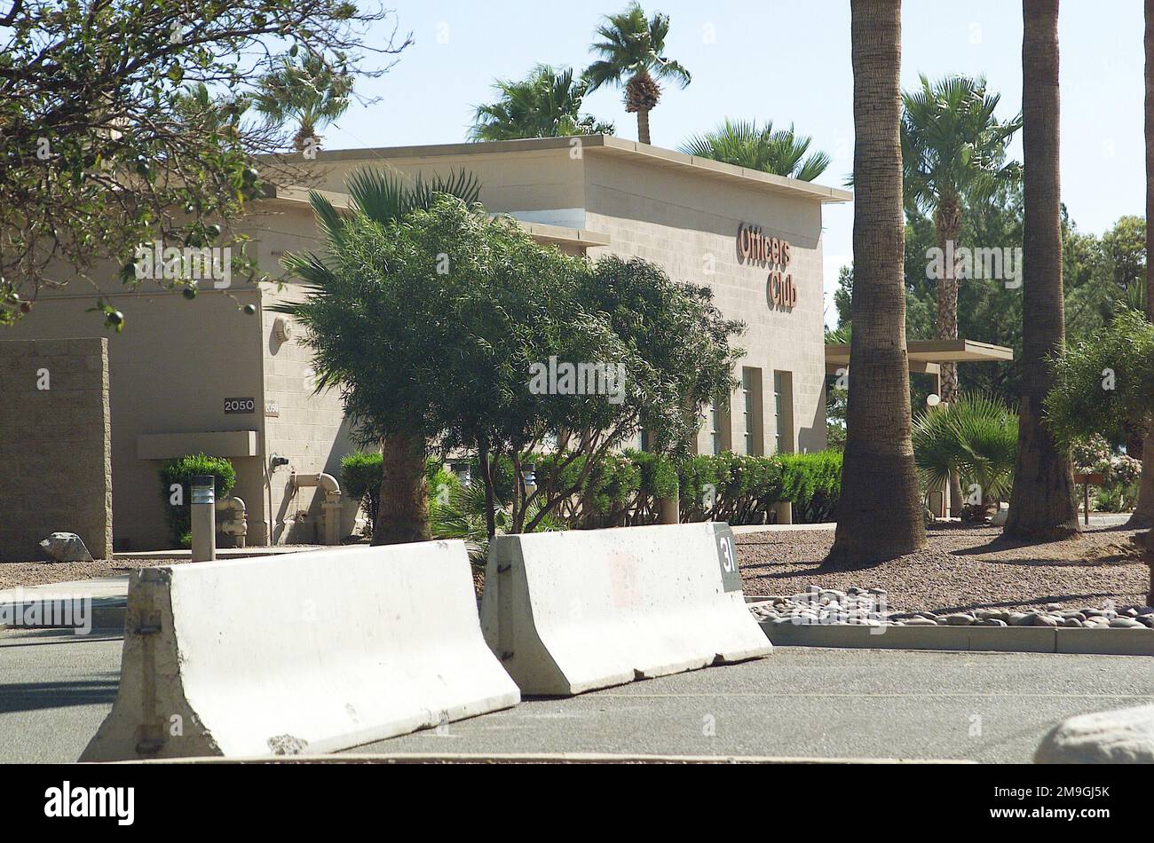Barriers block access to the Officers Club by vehicles as personnel at ...