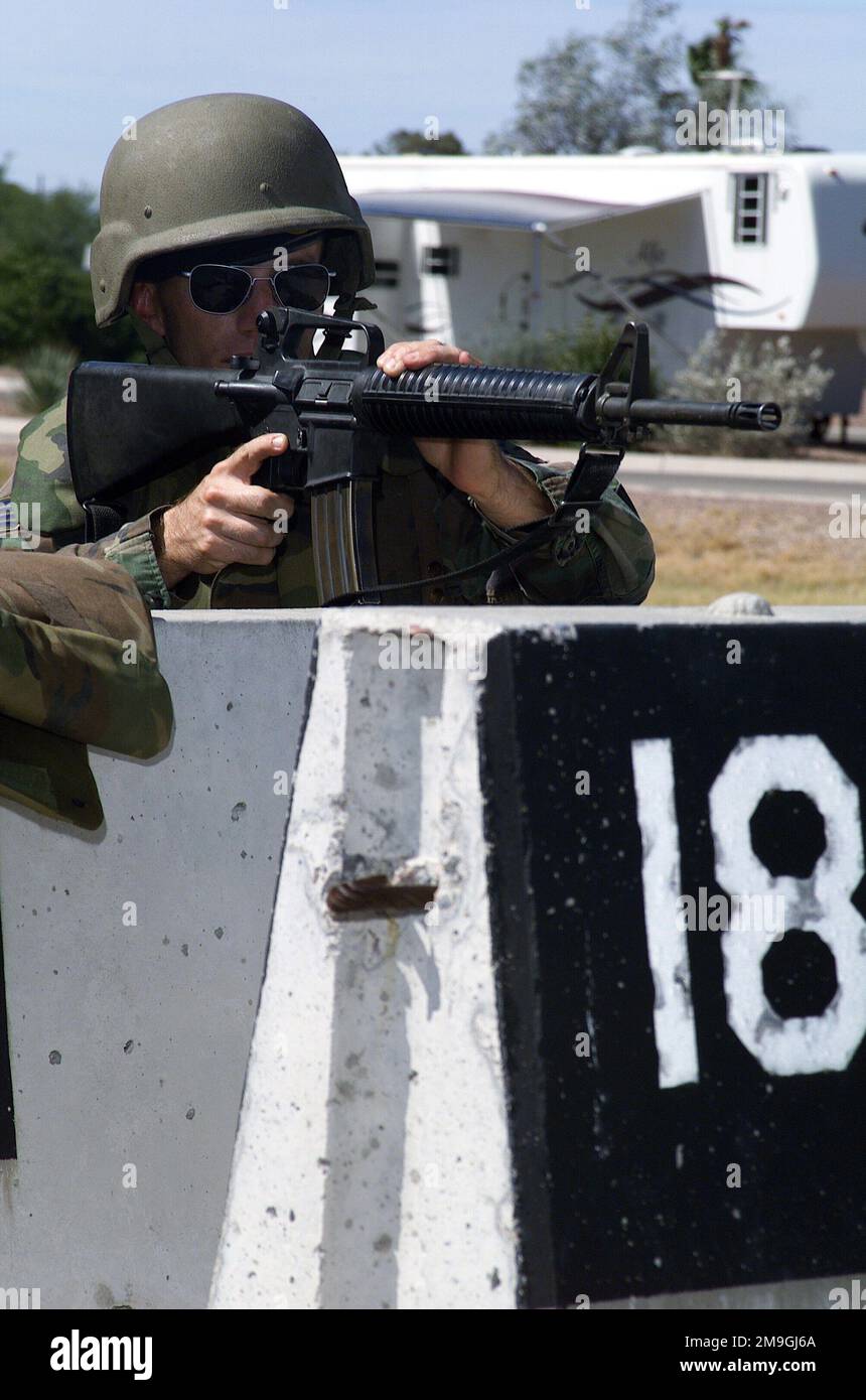Armed and ready with their Colt 5.56 mm M16A2 rifles several members at Davis-Monthan Air Force ...