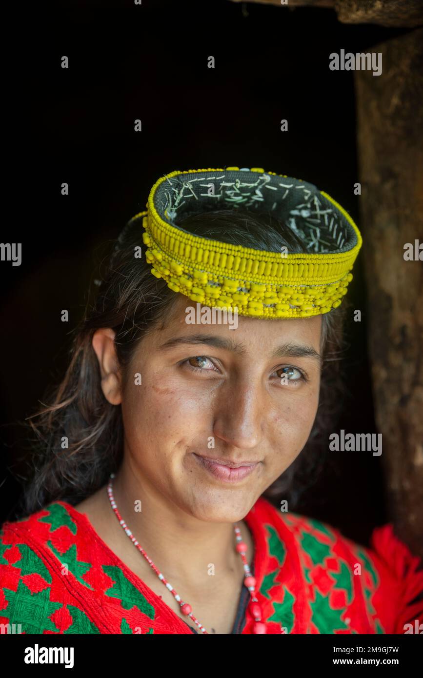 Portrait of a Kalash girl with colorful traditional headdress, Bumburet ...