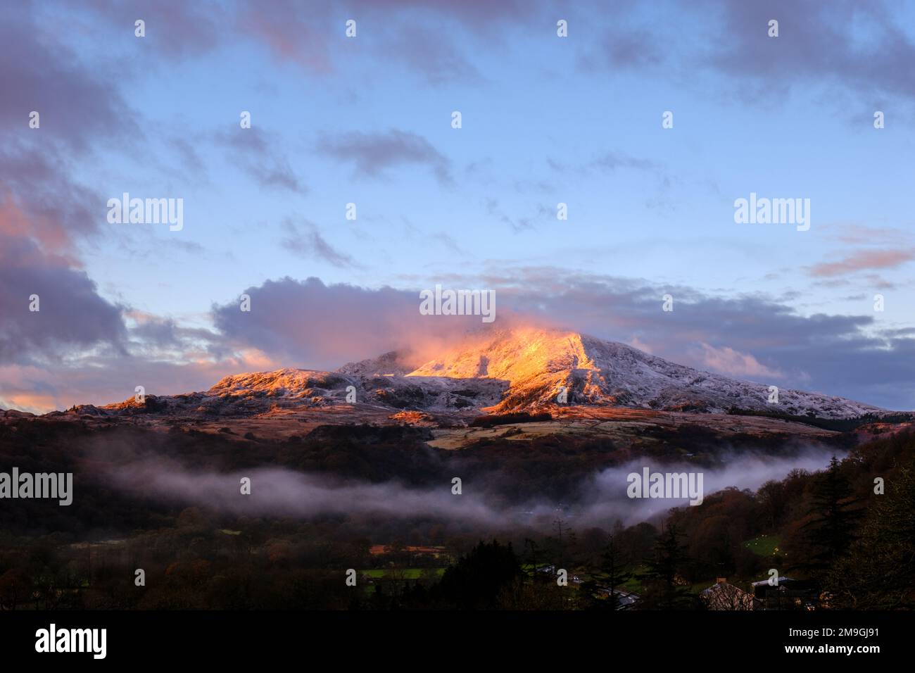 A snow covered portrait of Moel Siabod in Snowdonia National Park ...