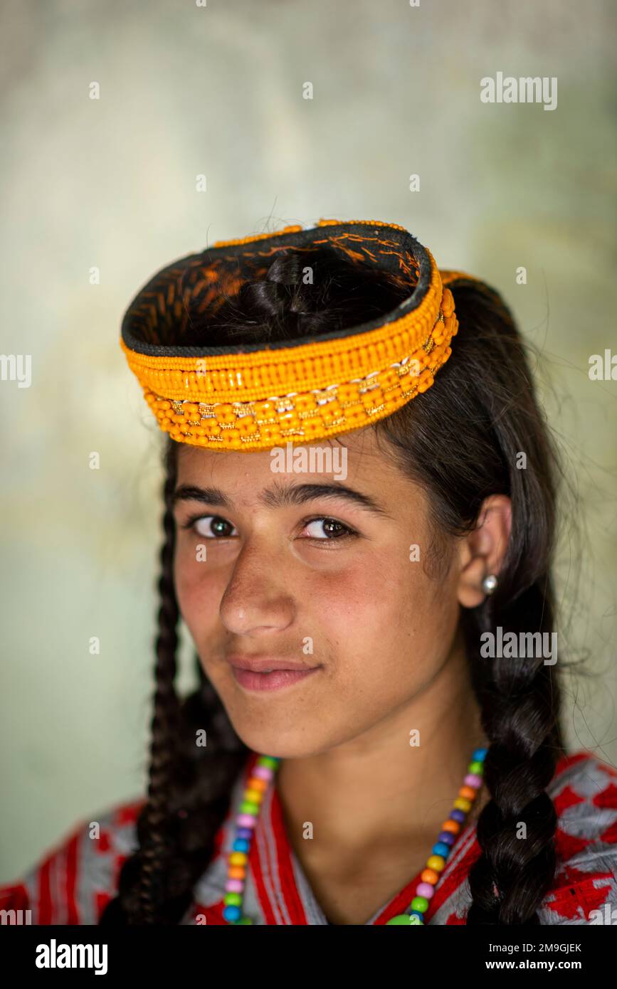 Portrait of a Kalash girl with colorful traditional headdress, Bumburet ...