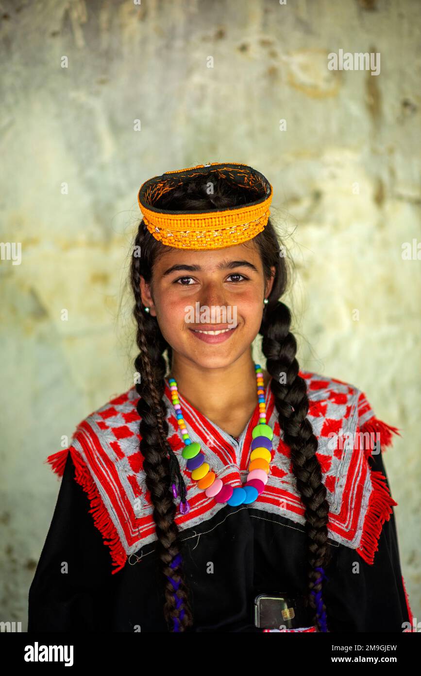 Portrait of a Kalash girl with colorful traditional headdress, Bumburet ...