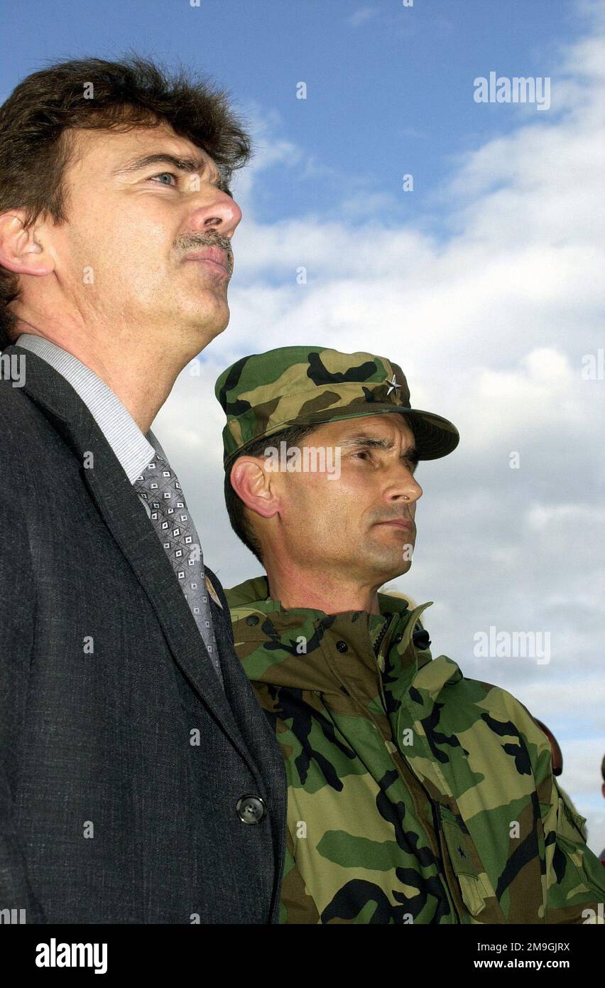 Brgermeister (Mayor) of Ramstein Village Klaus Layes stands shoulder-to ...