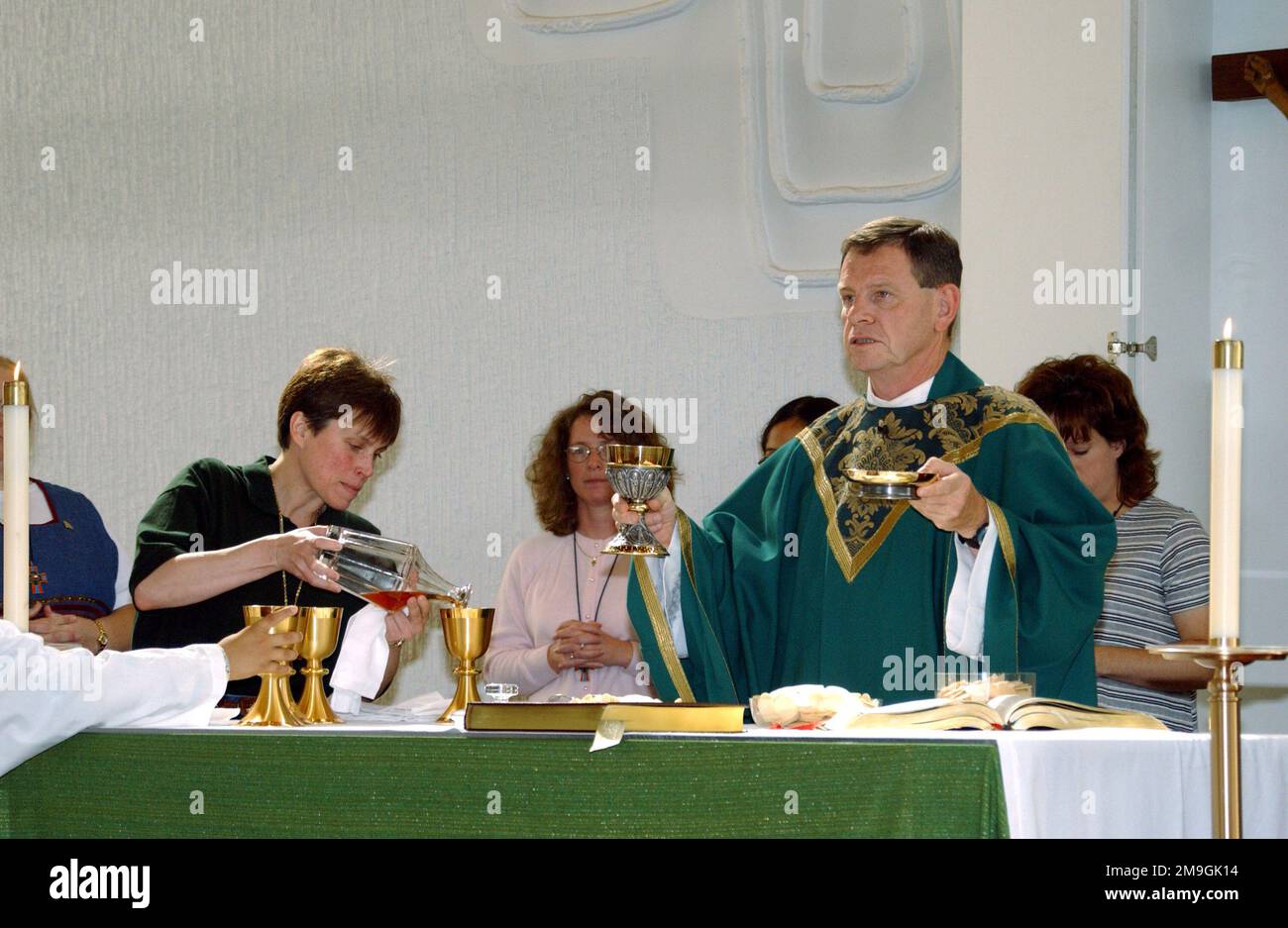 86th Airlift Wing Catholic Chaplain, Father Thomas Doyle completes the ...