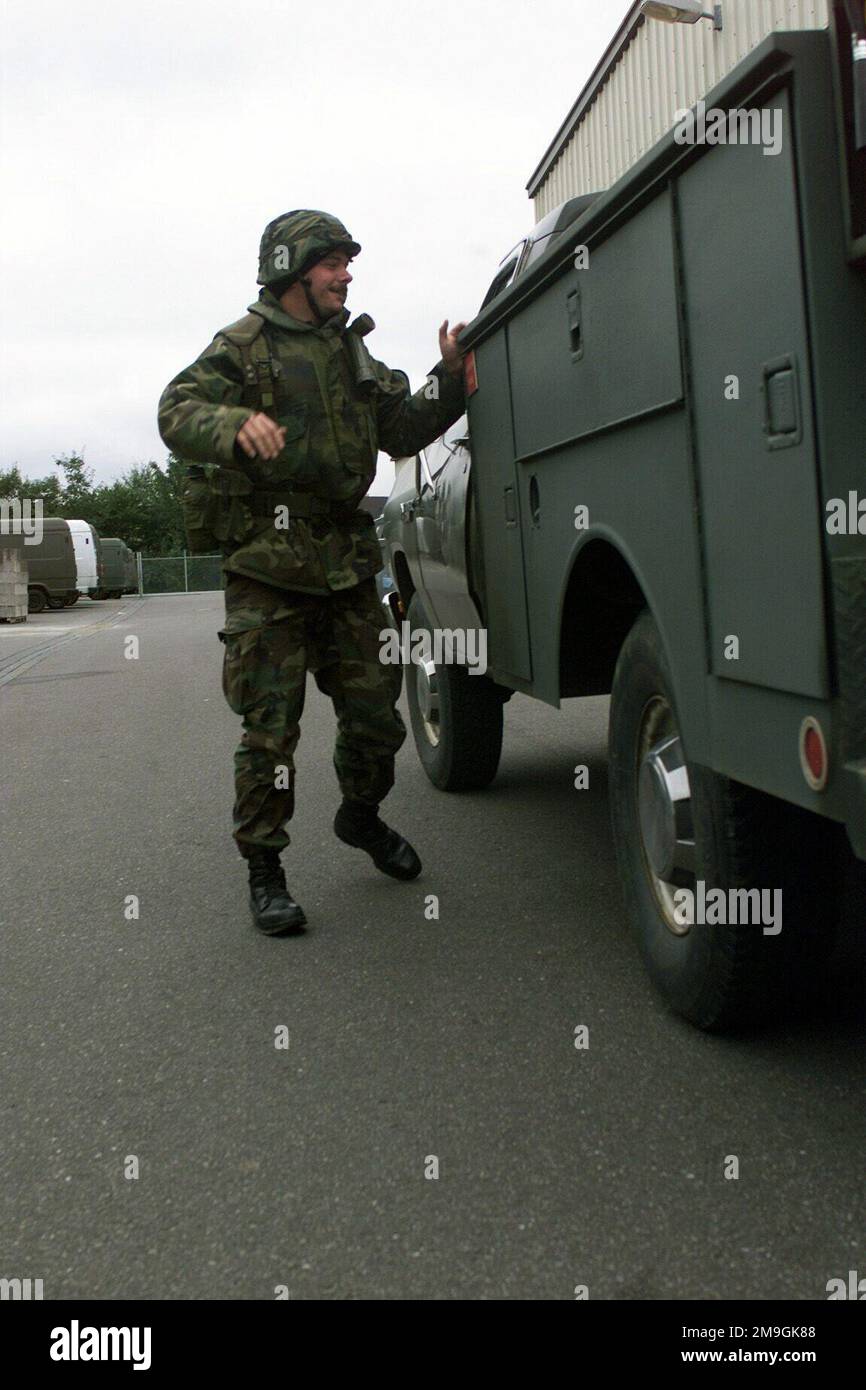 AIRMAN First Class Derek Helms, USAF, structures specialist, 52nd Civil ...