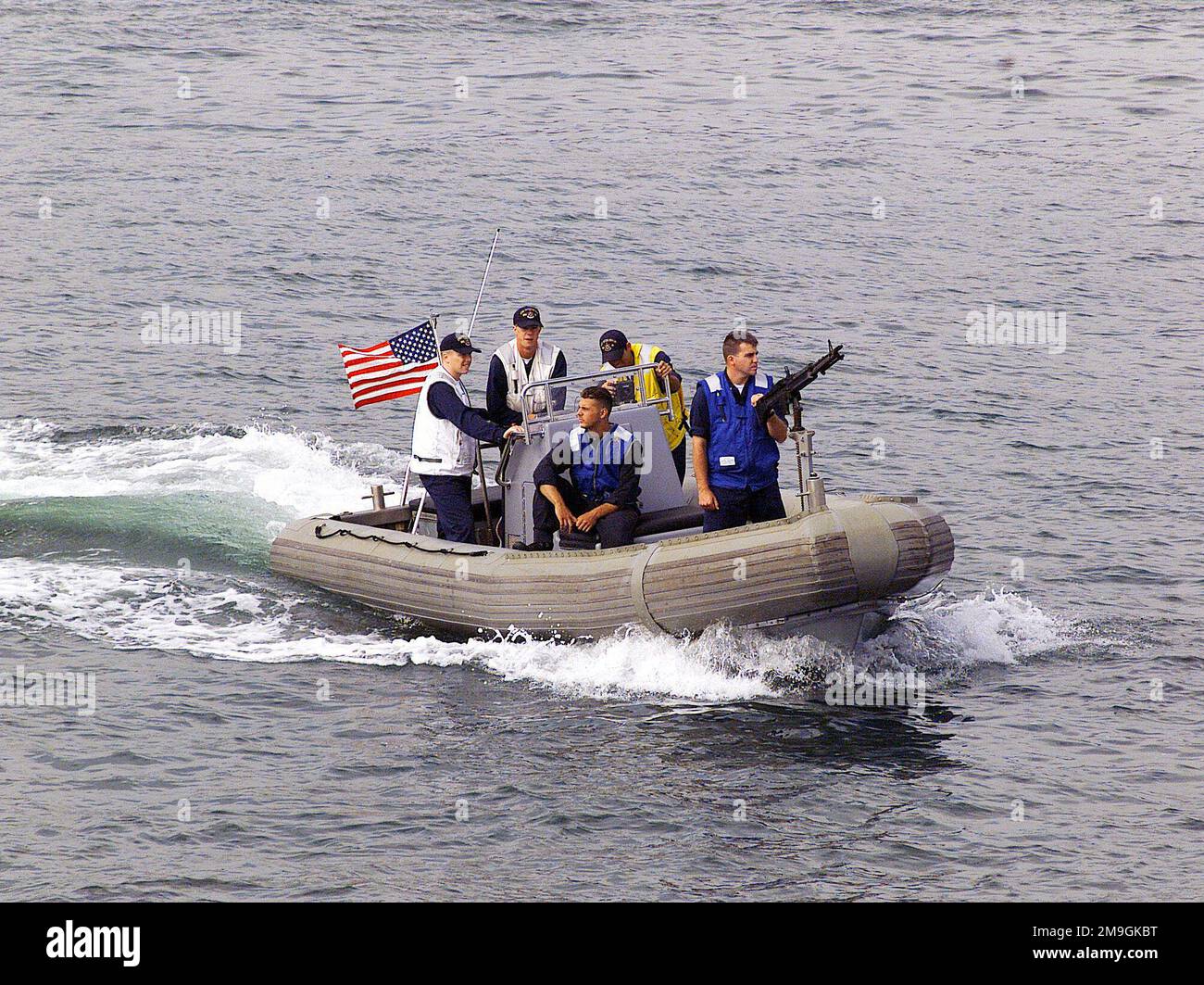 Crewmembers assigned to USS FITZGERALD (DDG 62) (not shown), man the ...
