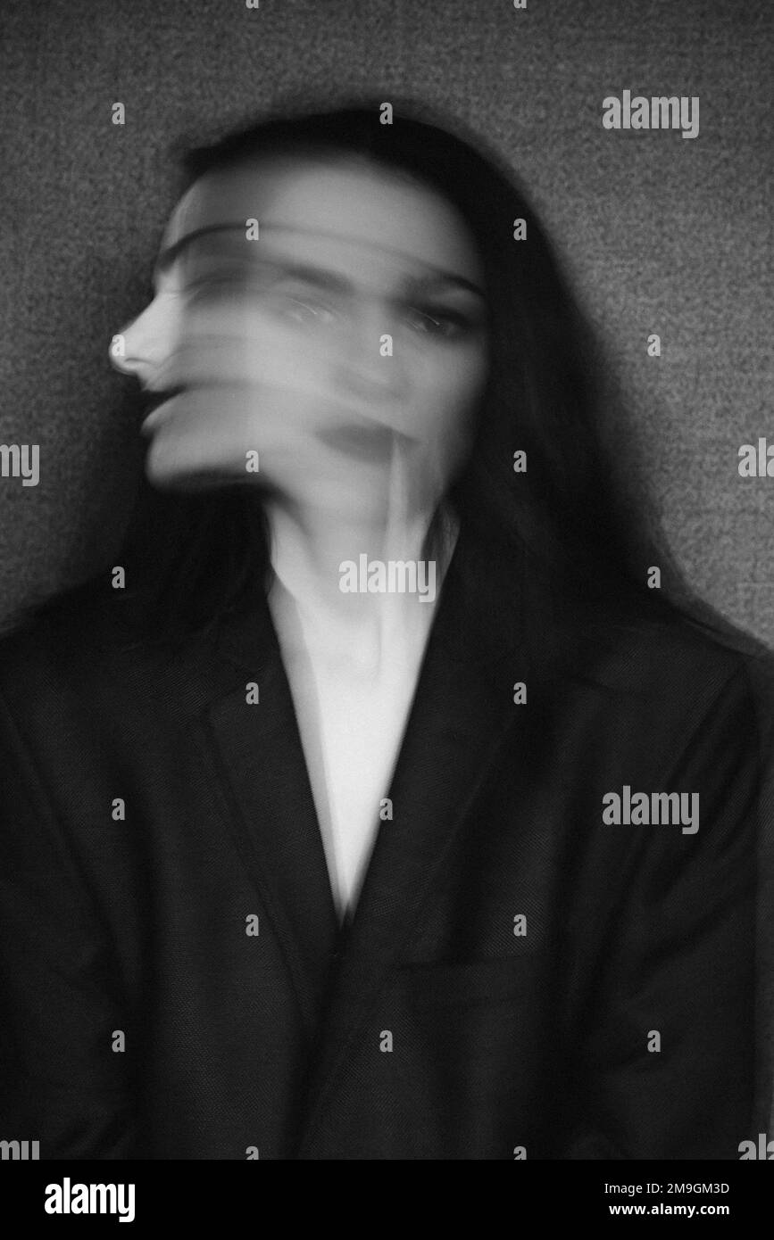 crazy portrait of a girl with mental disorders and split personality ...