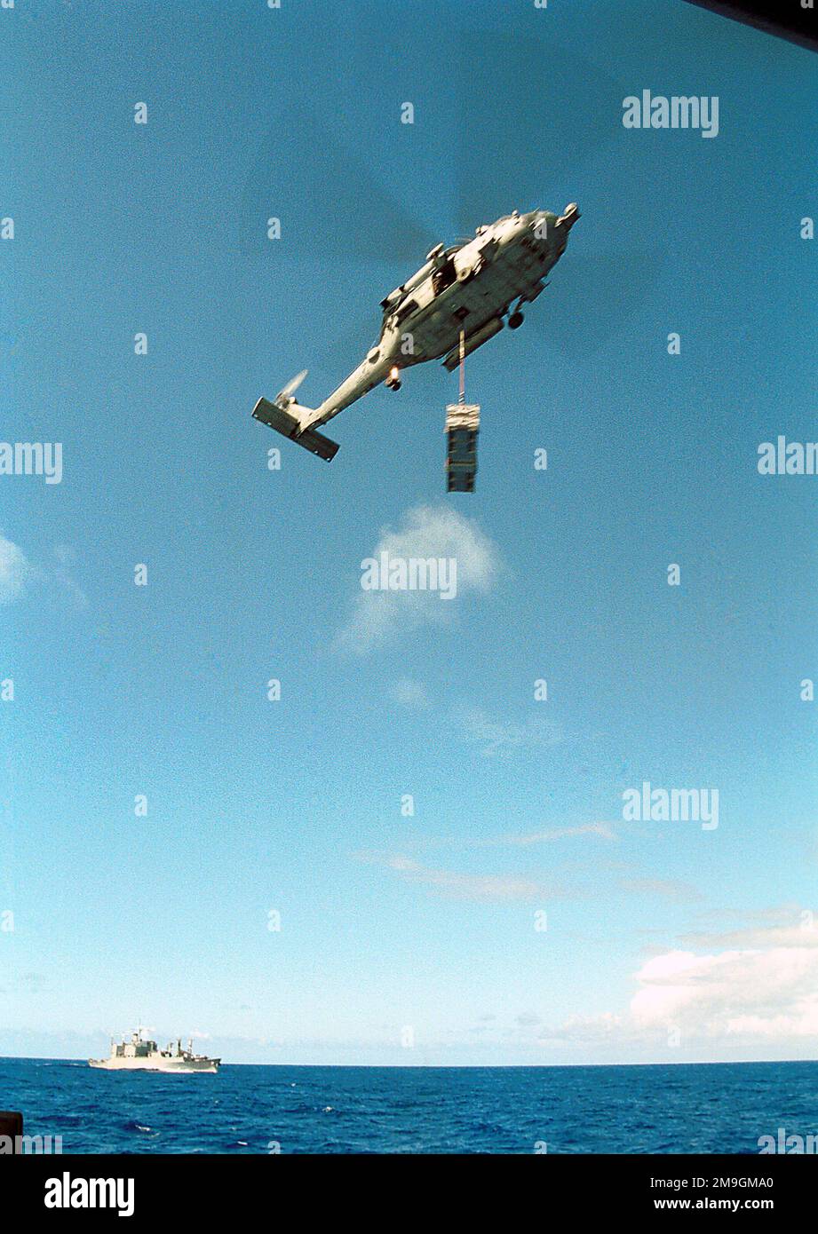 Low angle view showing a US Navy (USN) SH-60F Seahawk helicopter from ...