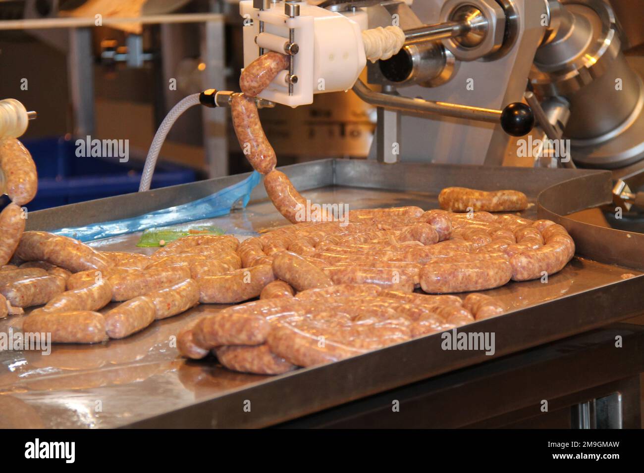 A Food Processing Machine Making Fresh Sausages Stock Photo - Alamy