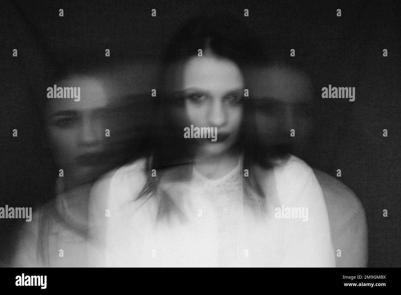 crazy portrait of a girl with mental disorders and split personality ...