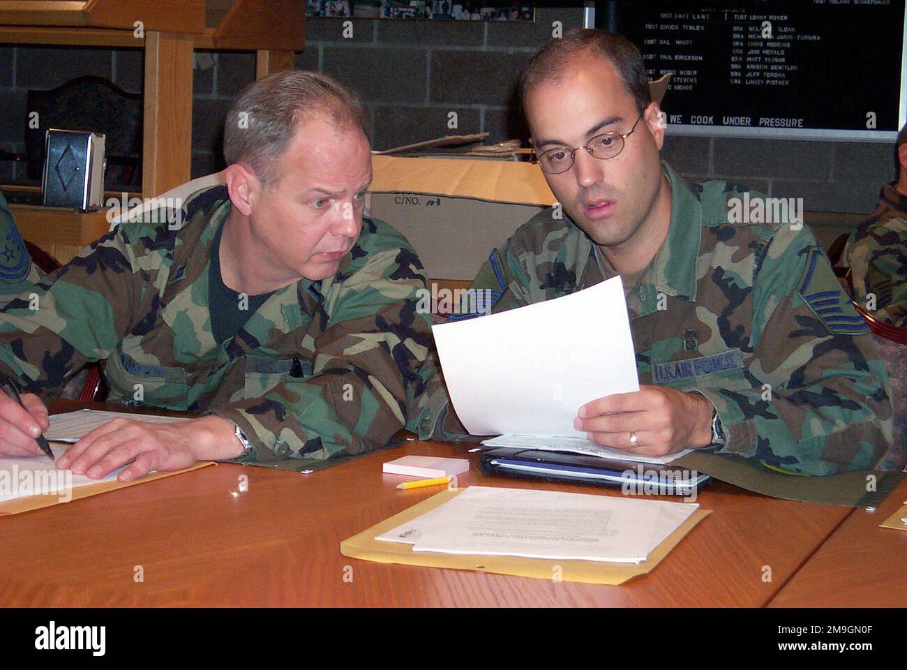 Captain Kevin Bowman, USAF, (left) and MASTER Sergeant Kelly Cummings ...