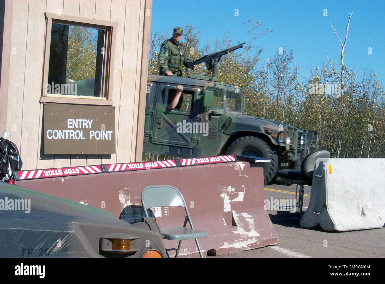 Manning an M998 High-Mobility Multipurpose Wheeled Vehicle (HMMWV) with ...