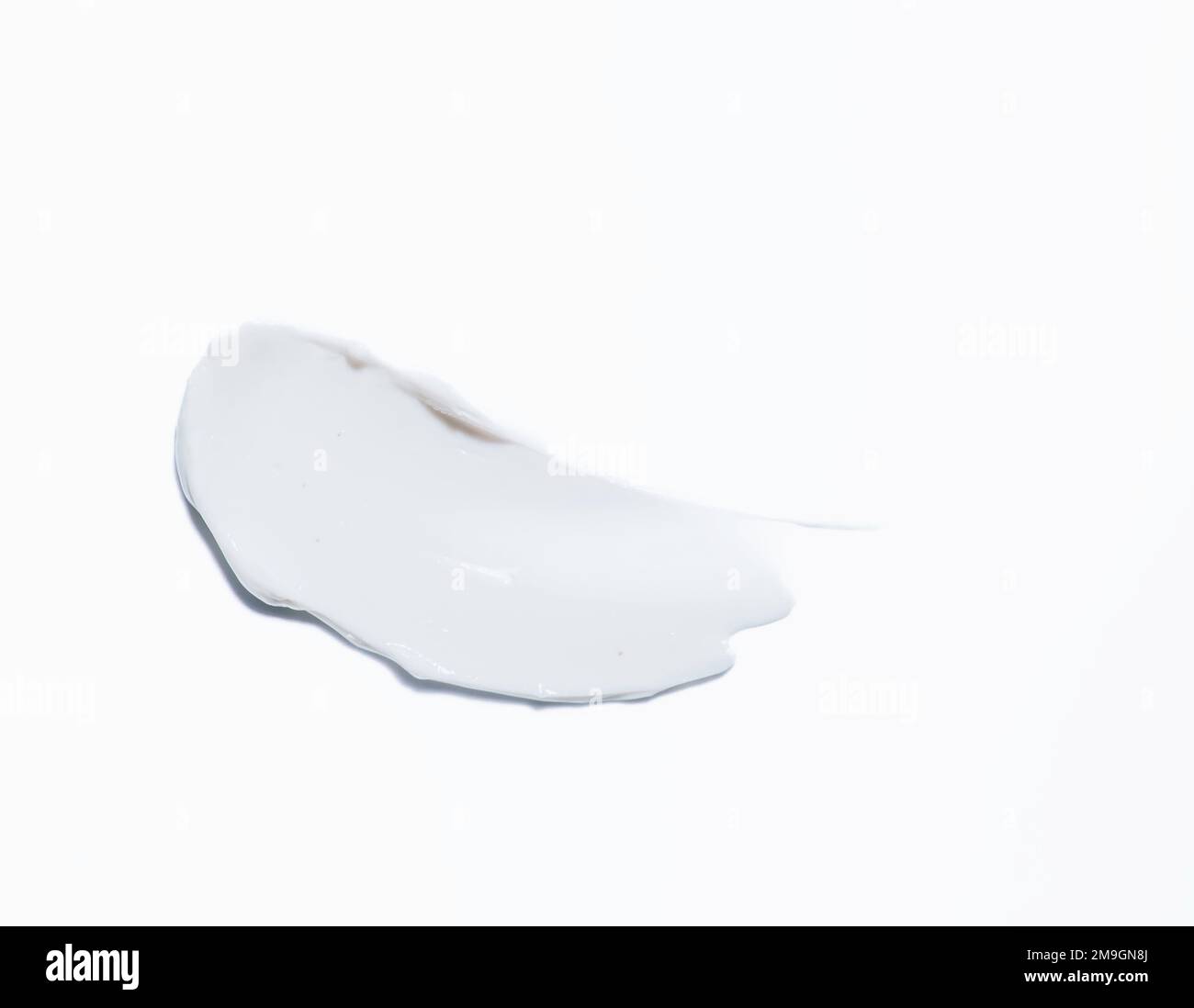 Liquid cream cosmetic smudge texture on a white isolated background ...
