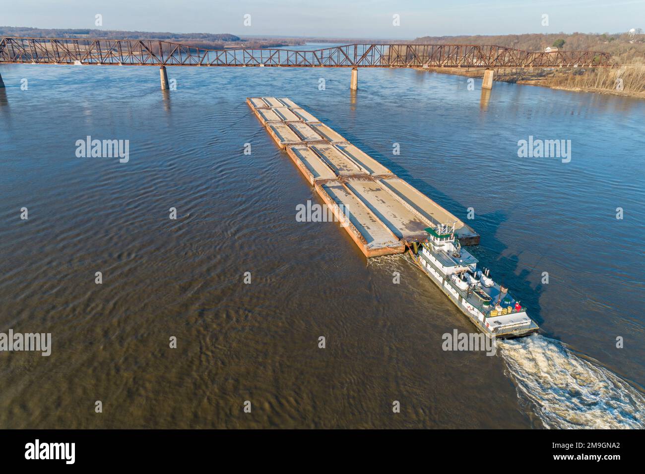 63807-00814 Aerial view of Barge on the Mississippi River passing under ...