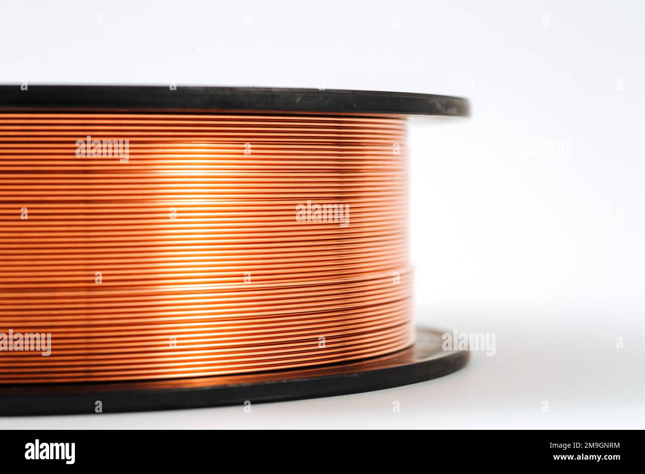 Welding wire spool on a white background Stock Photo - Alamy
