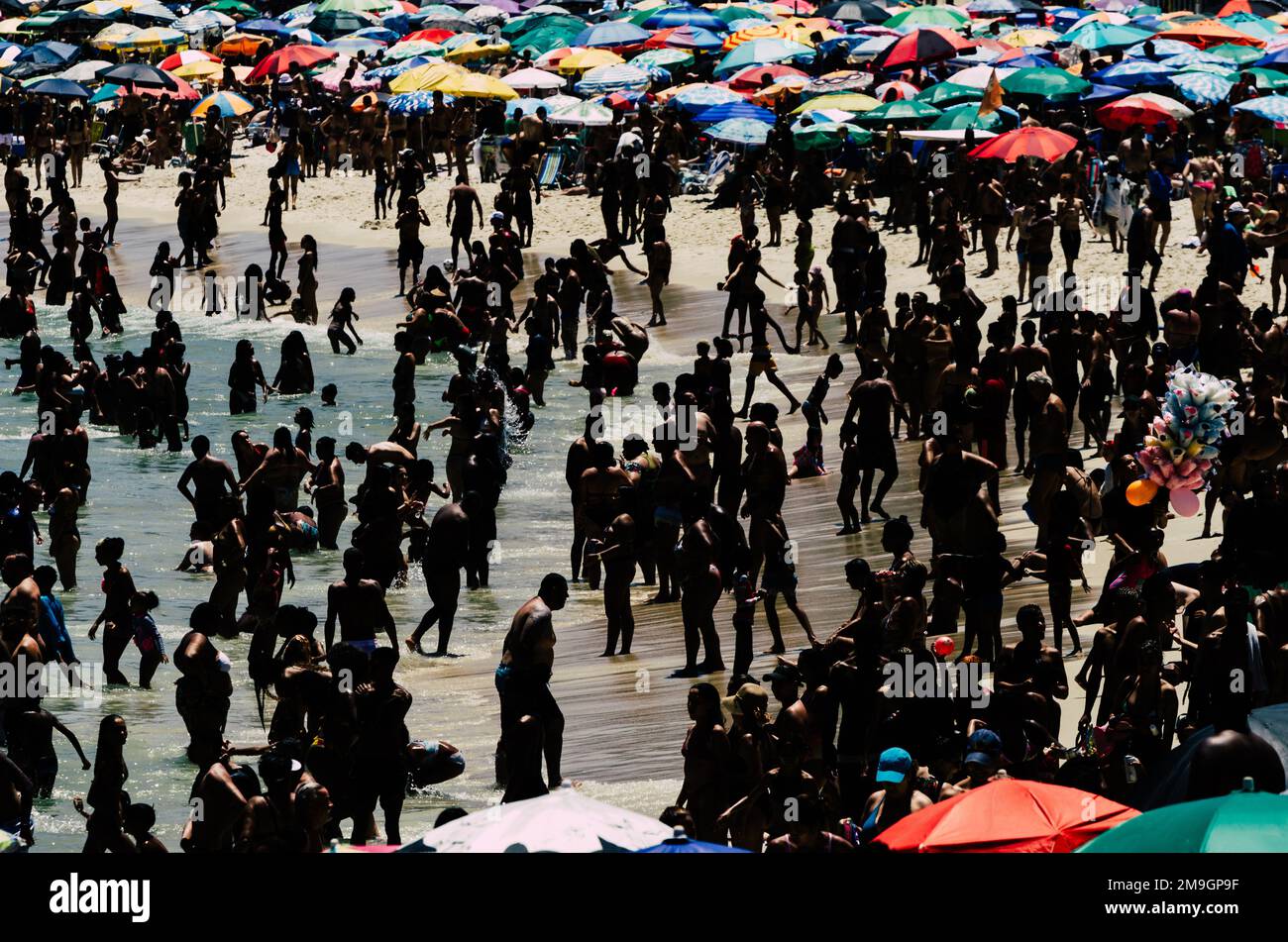 Crowd of people at Leme and Copacabana beach on a hot summer day, Rio ...