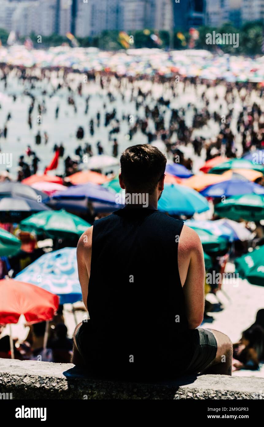 Crowd of people at Leme and Copacabana beach on a hot summer day, Rio ...