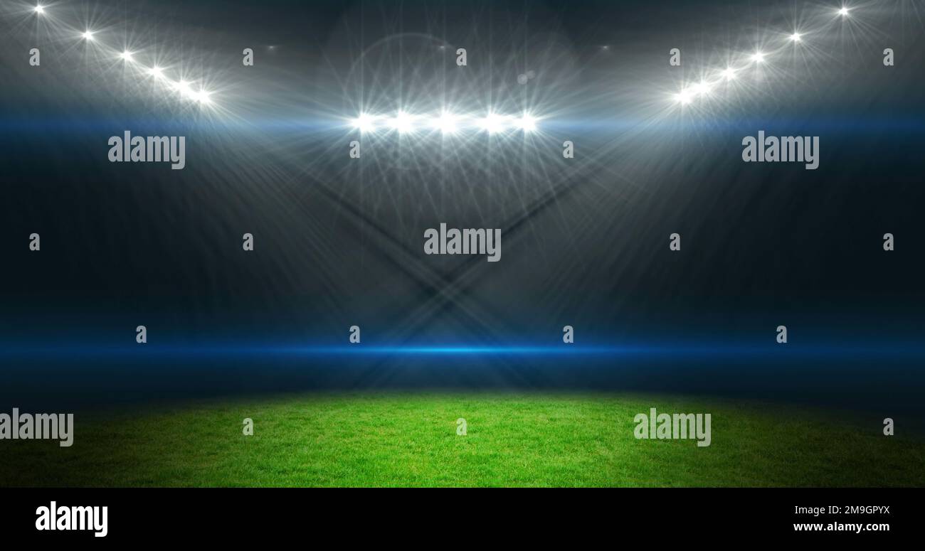 Image of empty sports stadium with glowing spotlights Stock Photo - Alamy