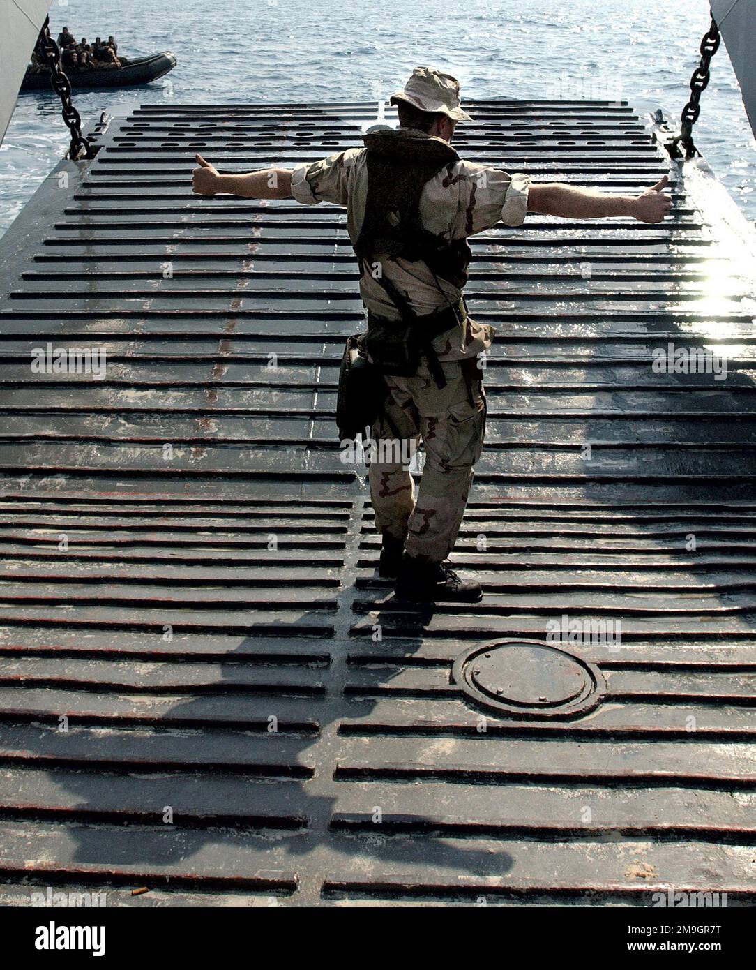 011013-F-0193C-020. [Complete] Scene Caption: Navy SEAMAN Chris Martin ...