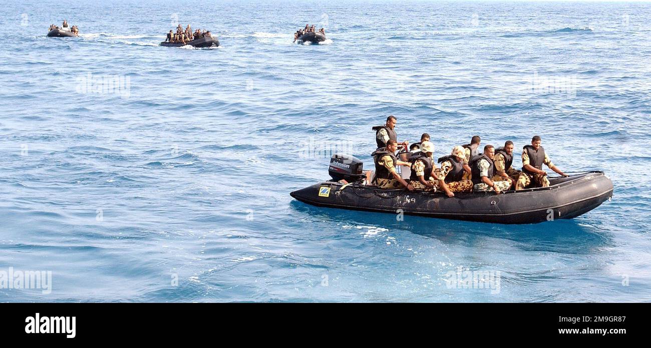 011013-F-0193C-018. [Complete] Scene Caption: After departing the Navy ...